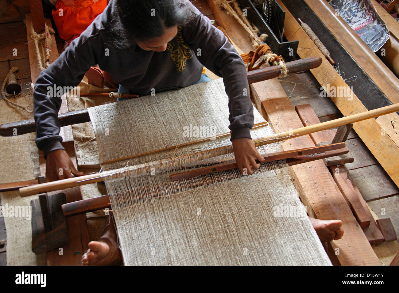 Malagasy Woman Spinning and Weaving Silk from the African Silk Moth ...
