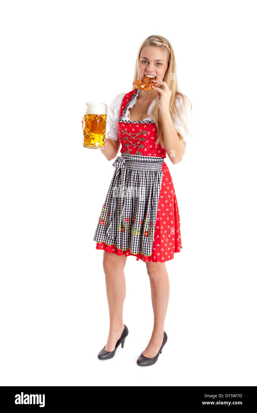 Blonde woman in traditional costume with beer and pretzels Stock Photo ...