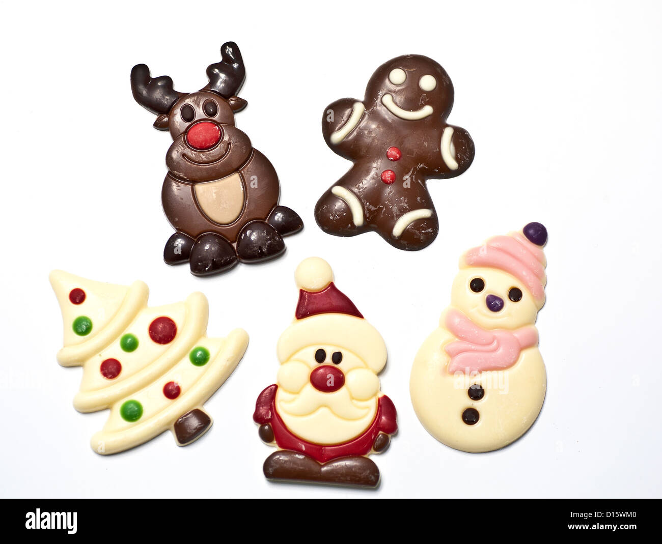 Five different Christmas figures made in chocolate Stock Photo - Alamy