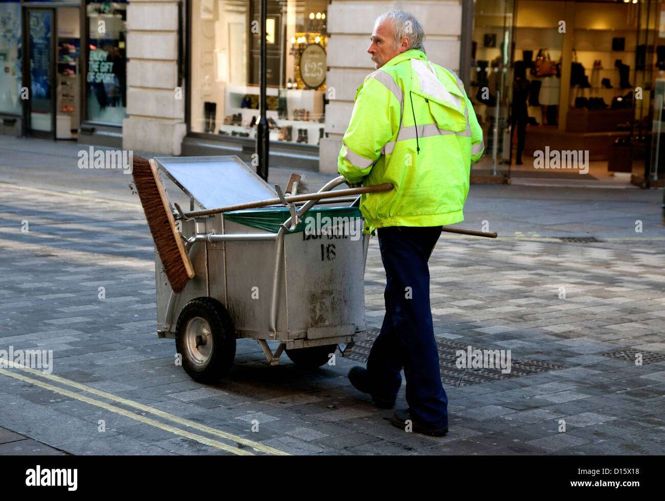 Road sweeper in Central London street Stock Photo - Alamy