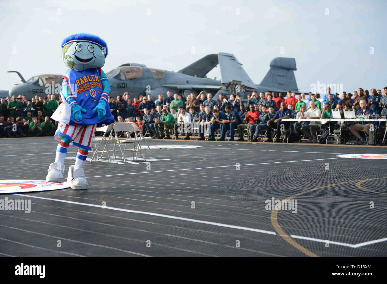Globie, the Harlem Globetrotters mascot, performs in the pre-game show ...