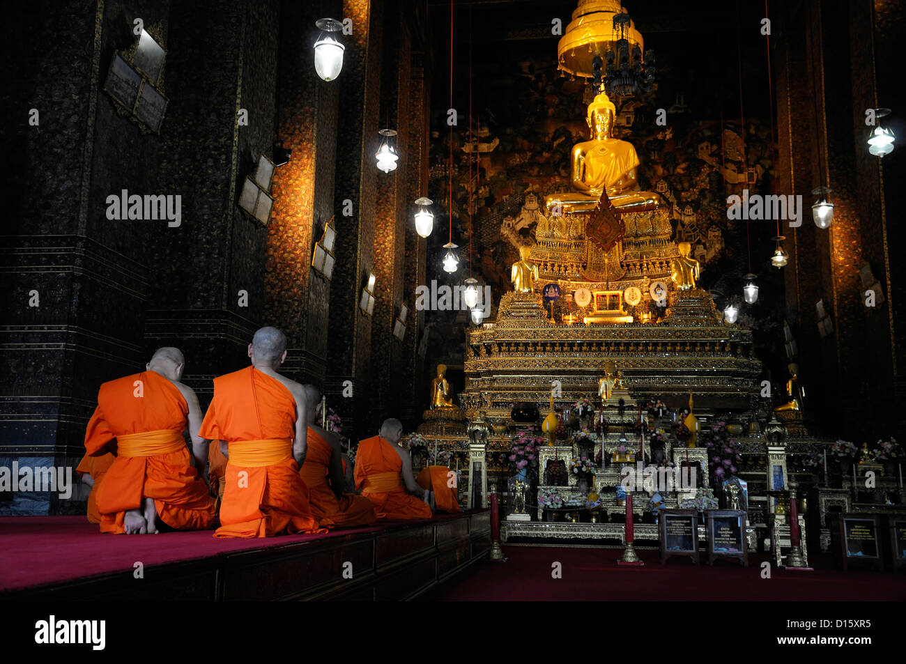 Buddhist monks praying orange hi-res stock photography and images - Alamy