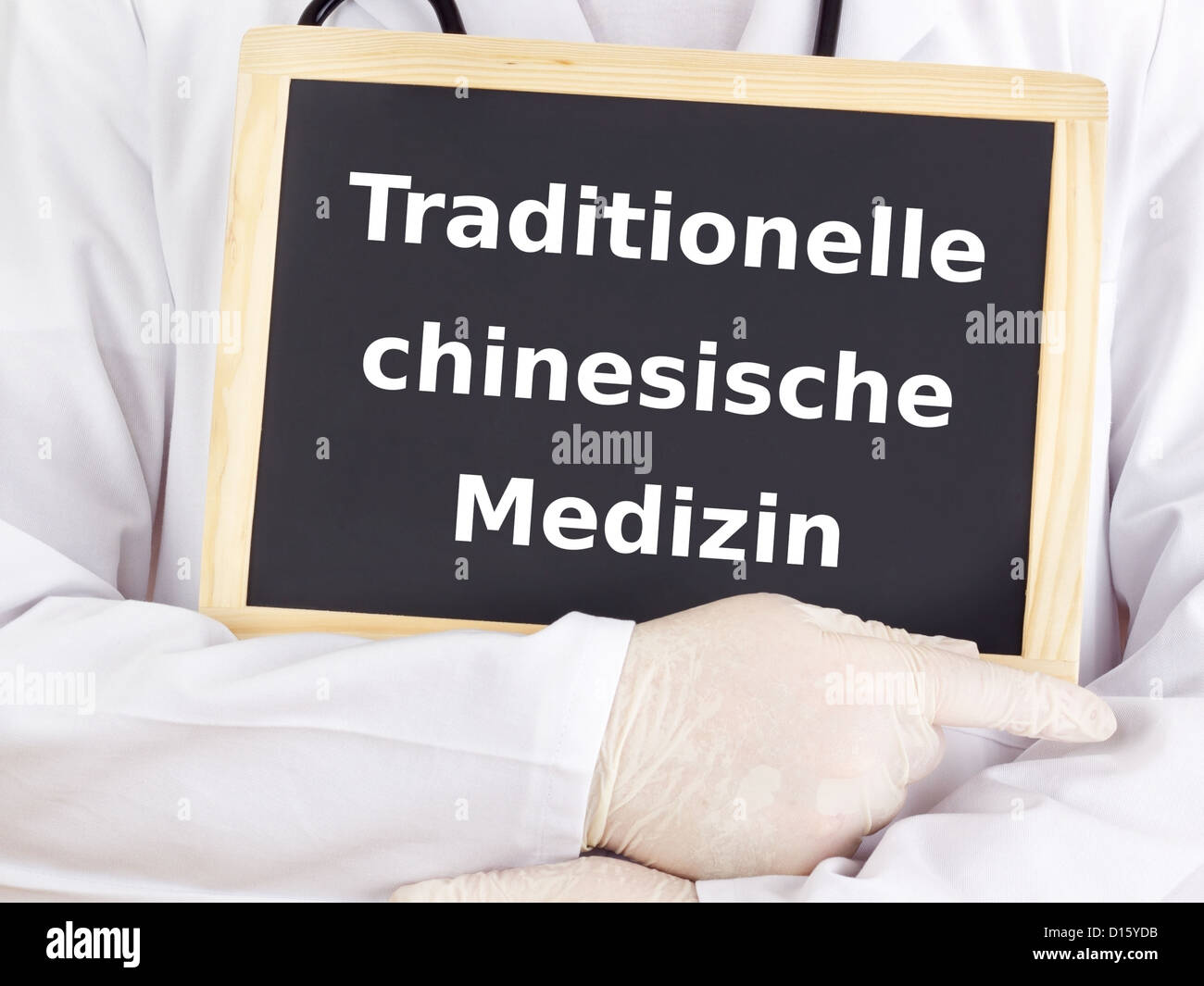 Doctor shows information: traditional chinese medicine Stock Photo - Alamy