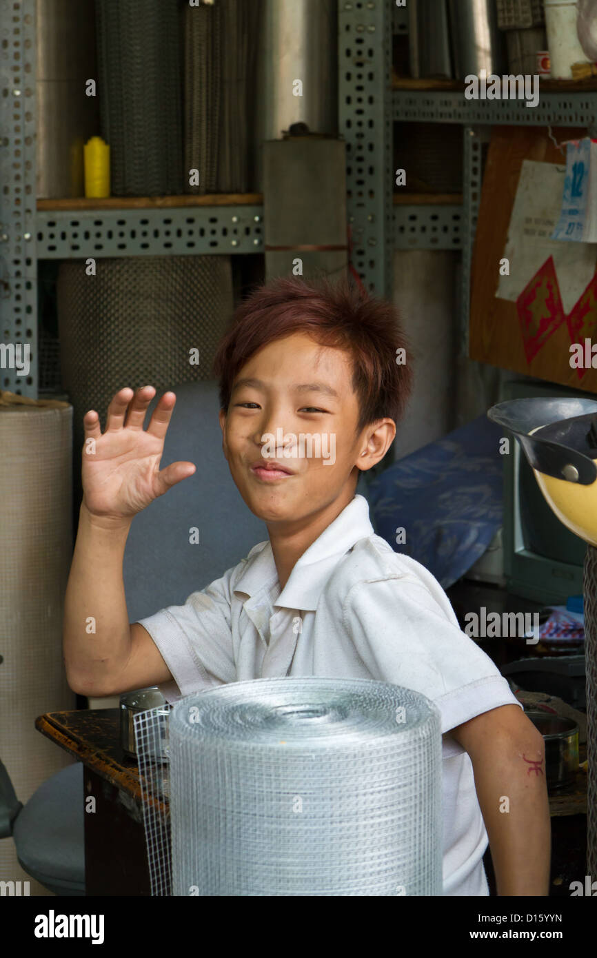 Friendly Boy in the Streets of Ho Chi Minh City, Vietnam Stock Photo ...