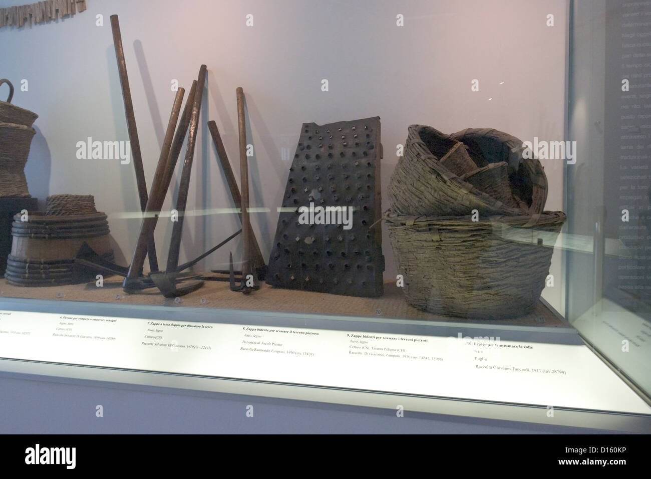 Various agricultural tools among which an harrow Stock Photo - Alamy