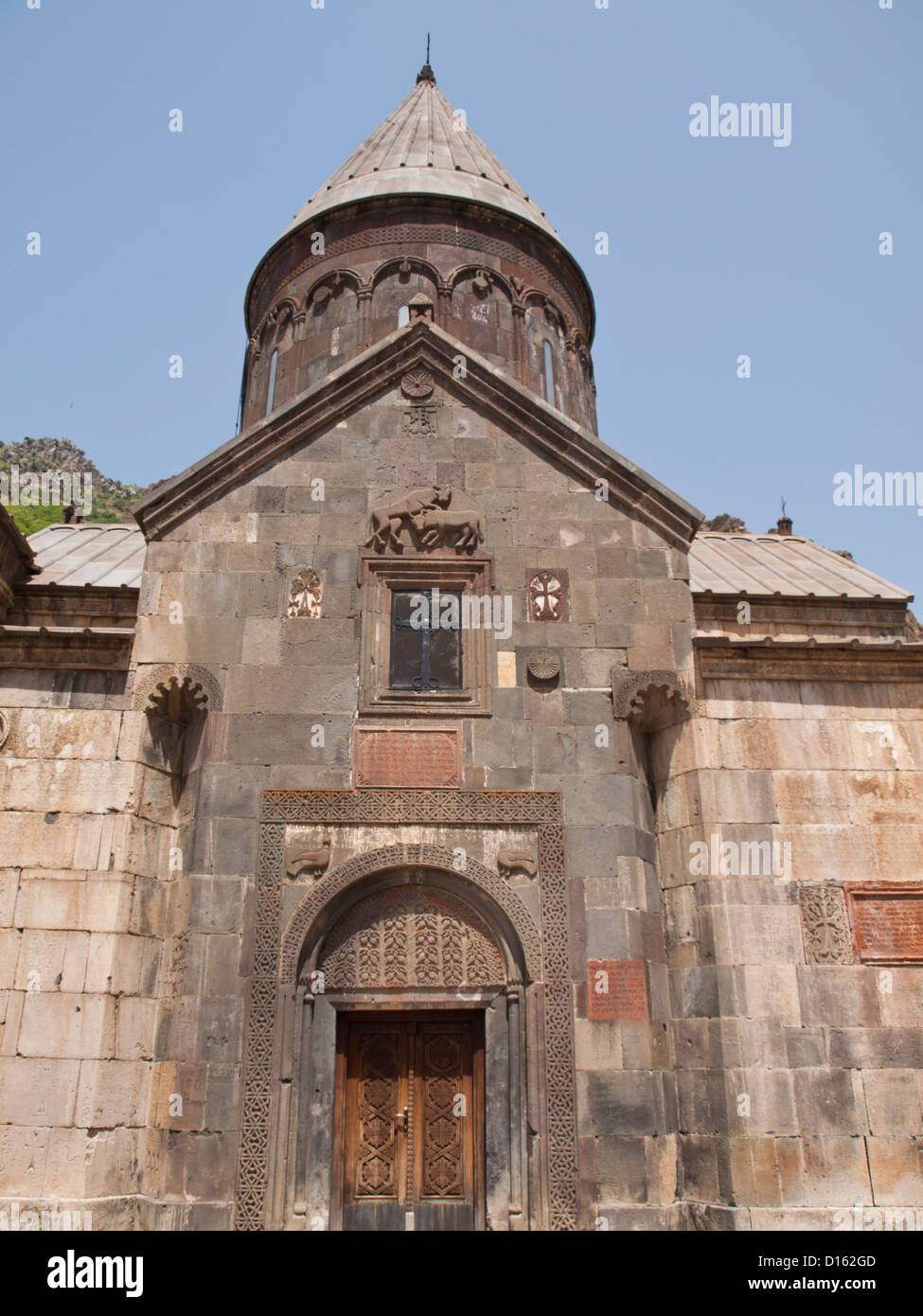 Geghard Monastery church facade Stock Photo - Alamy