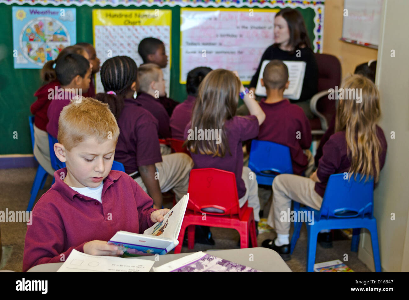 Boy reads reading book school elementary hi-res stock photography and ...