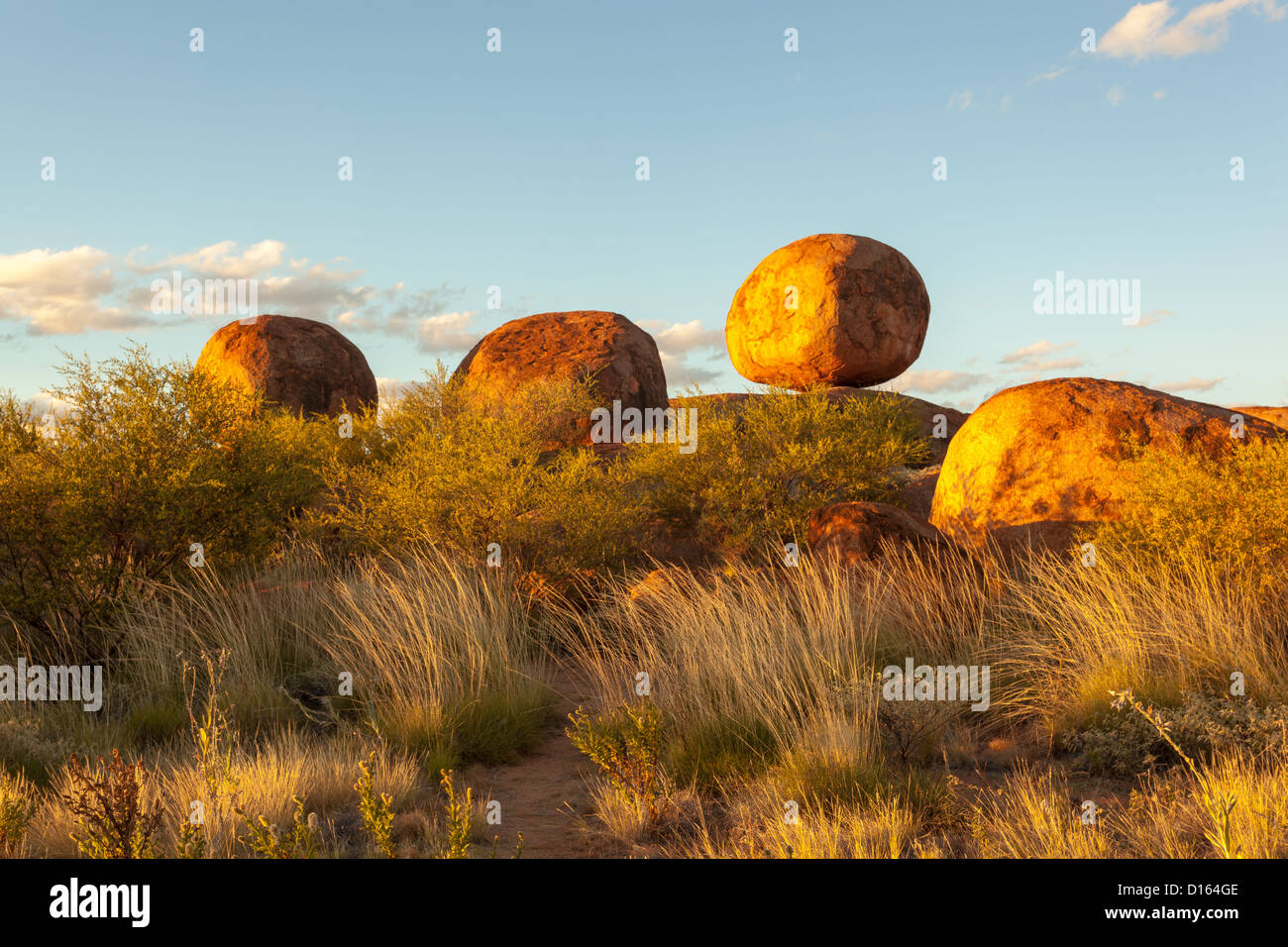 The balancing boulders of Karlu Karlu, the Devils Marbles, at sunset in ...