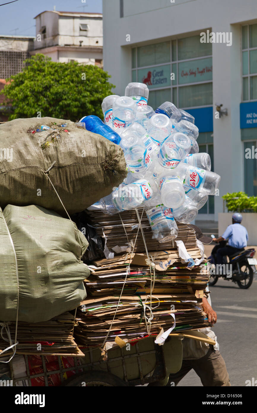 Overloaded Tricycle in the Streets of Ho Chi Minh City, Vietnam Stock ...
