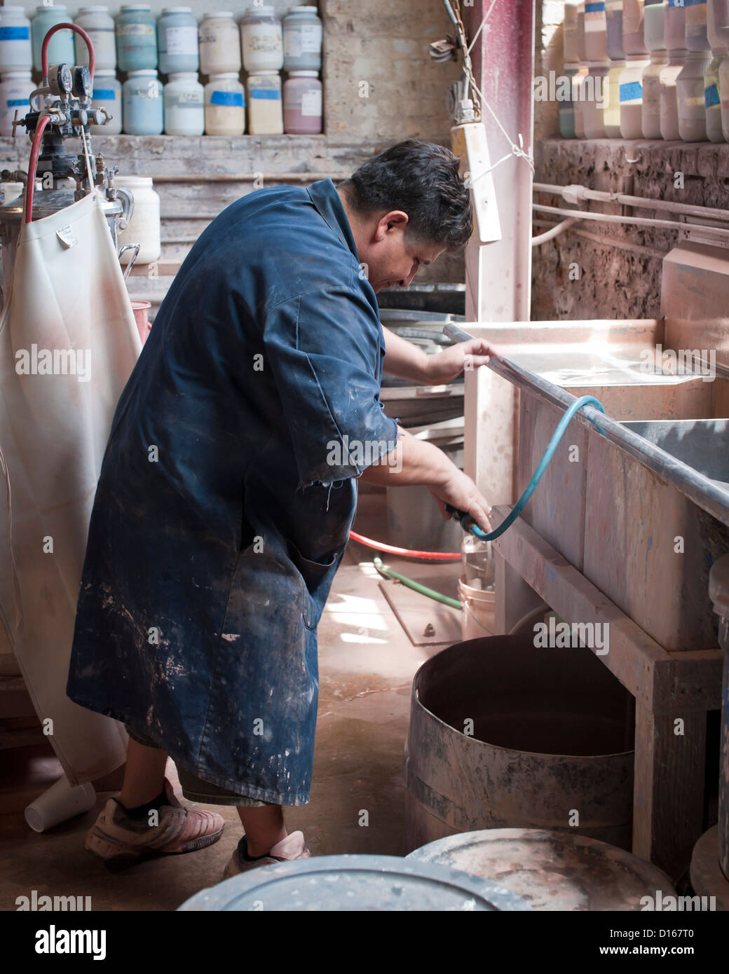 Worker in a clay tile factory,LA Stock Photo - Alamy