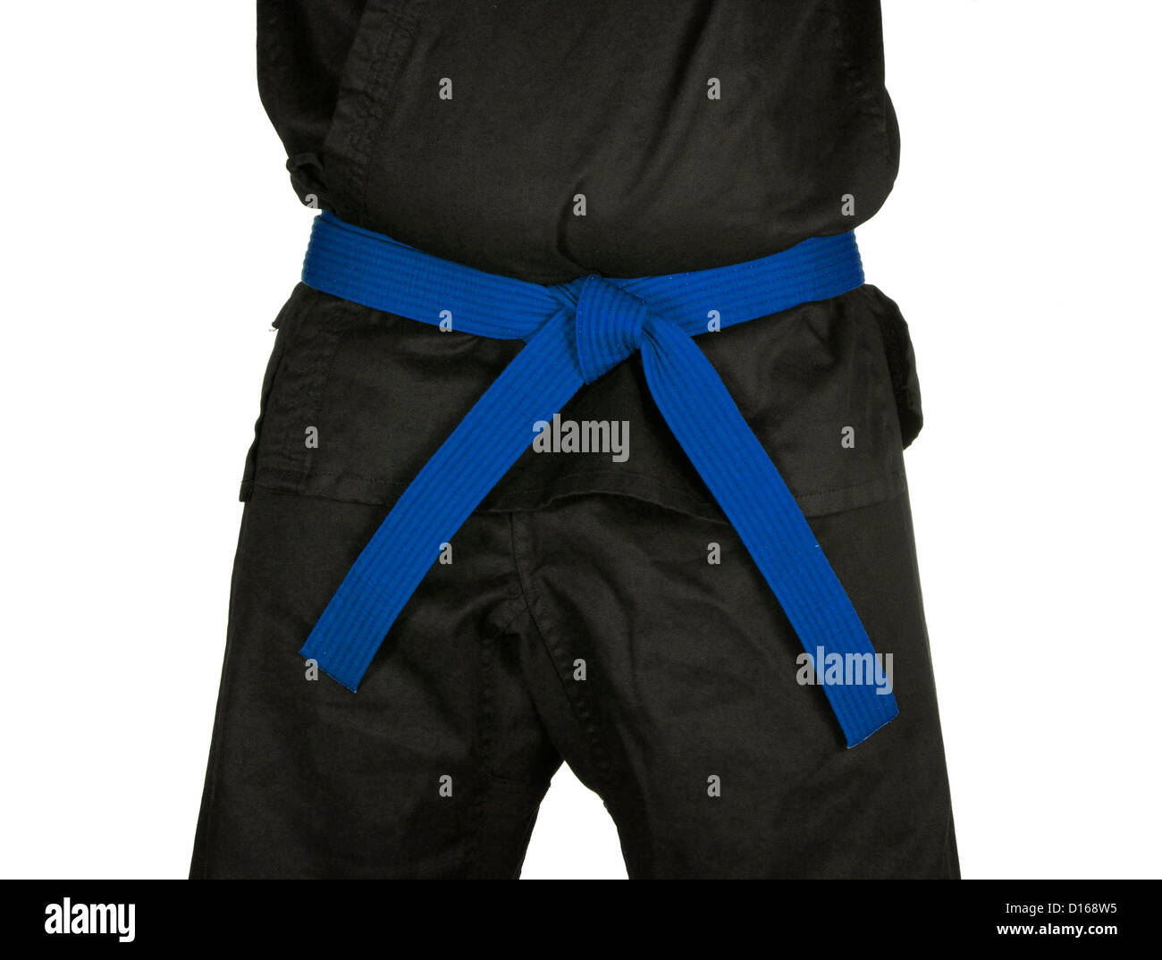 Karate blue belt tied around marital artists torso wearing black dojo ...