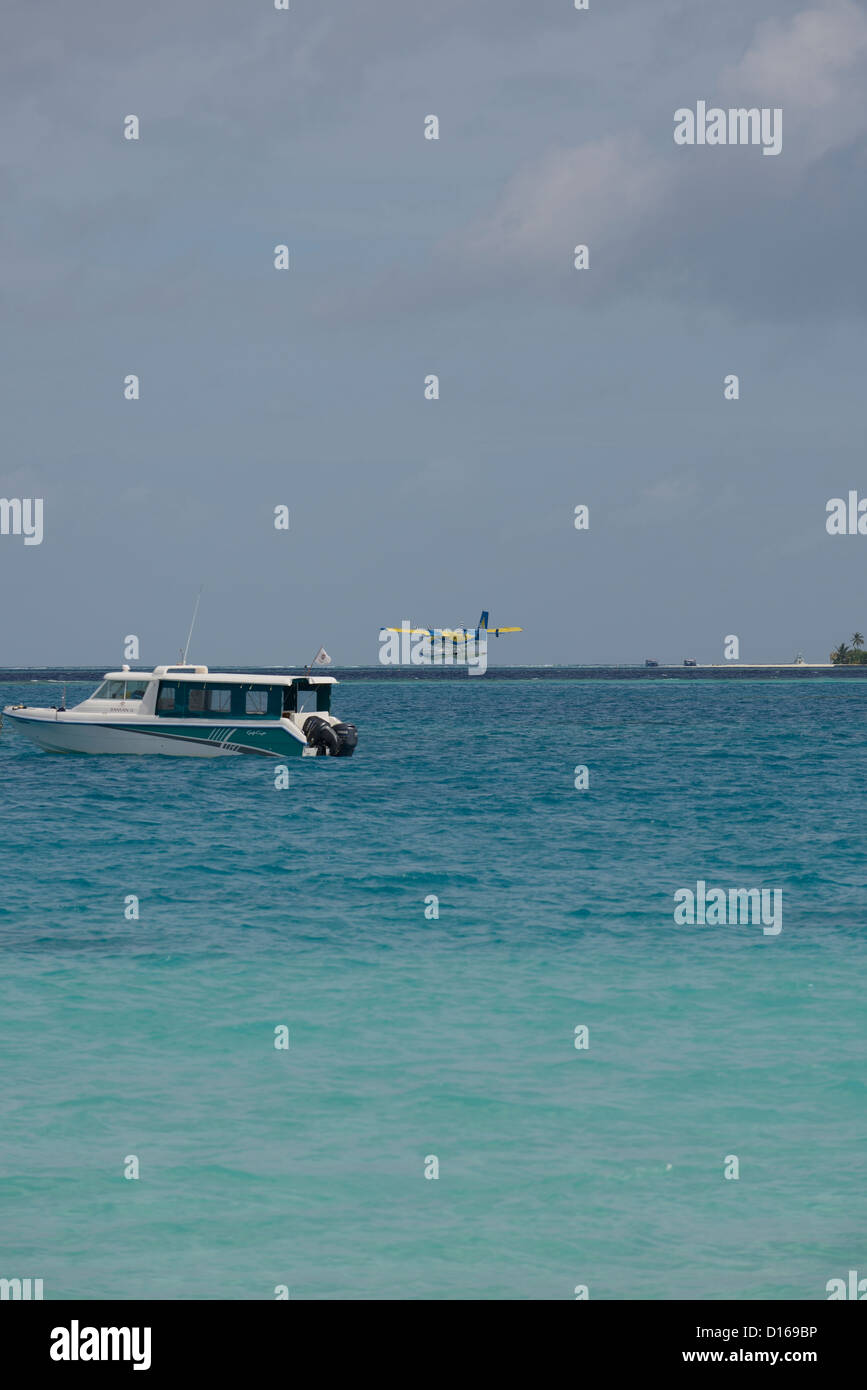 Maldives seaplane takeoff Stock Photo - Alamy