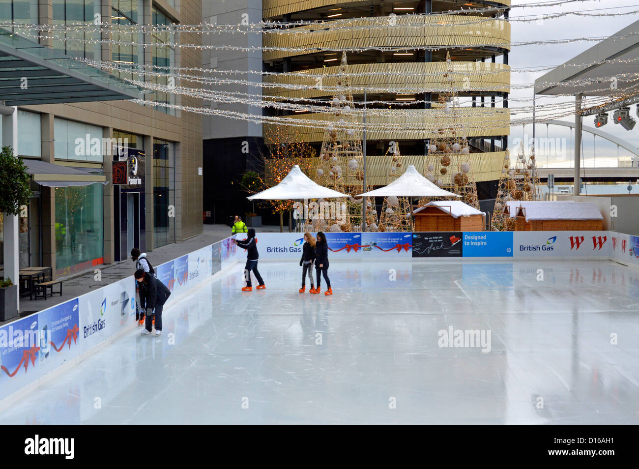 People using skating rink at the Westfield shopping centre complex with ...