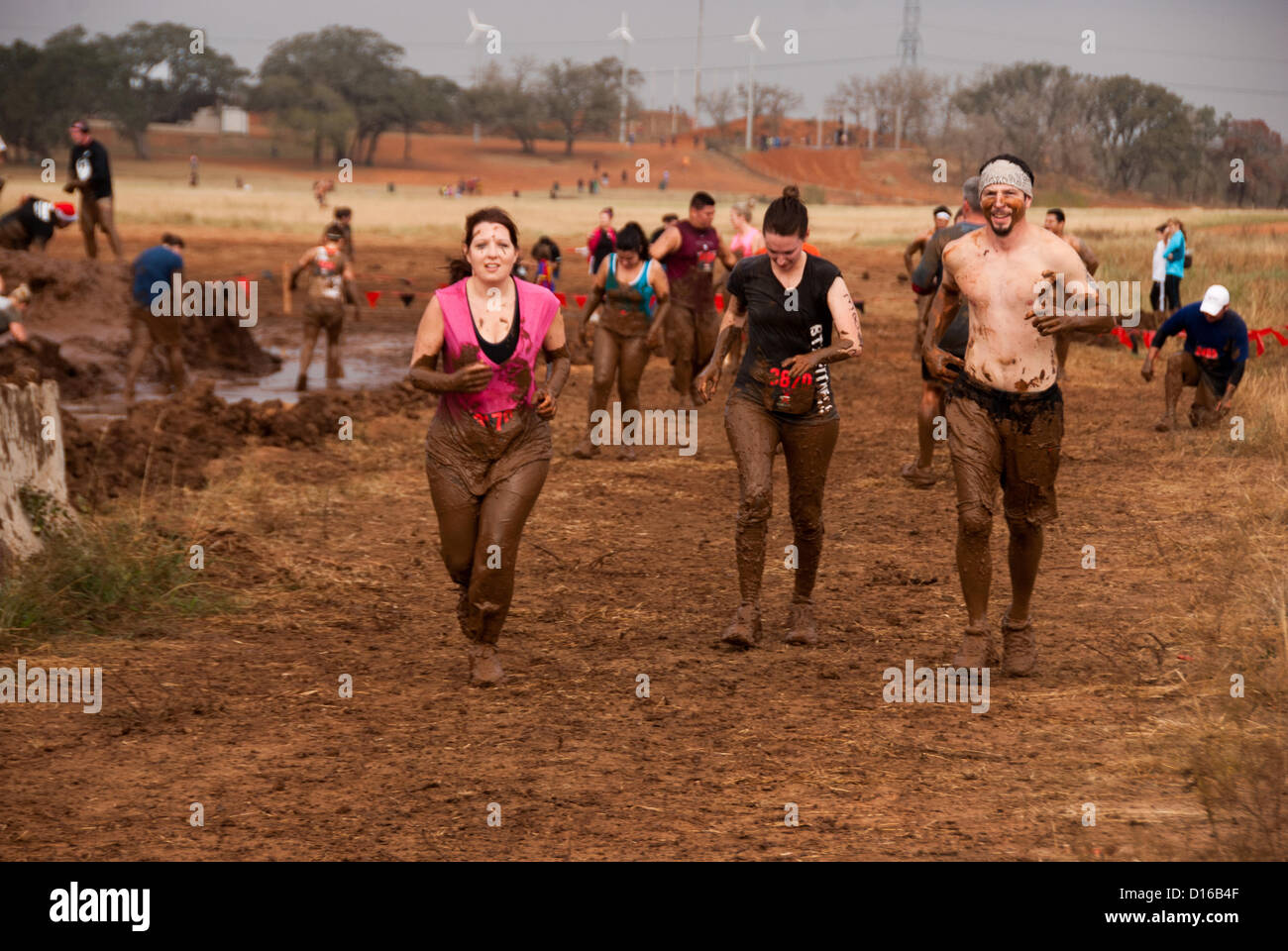 8 December 2012 San Antonio, Texas, USA - People encased in mud run ...