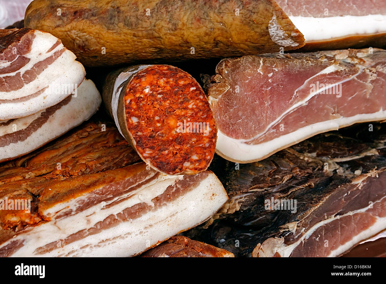 Pieces of smoked pork bacon overlapping.Traditional Romanian food ...