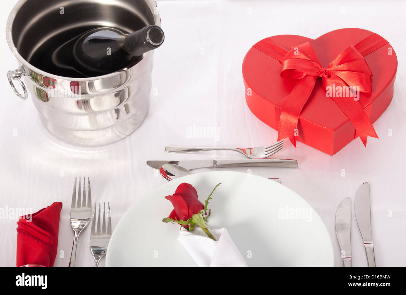 Romantic table setting with rose and cutlery Stock Photo - Alamy
