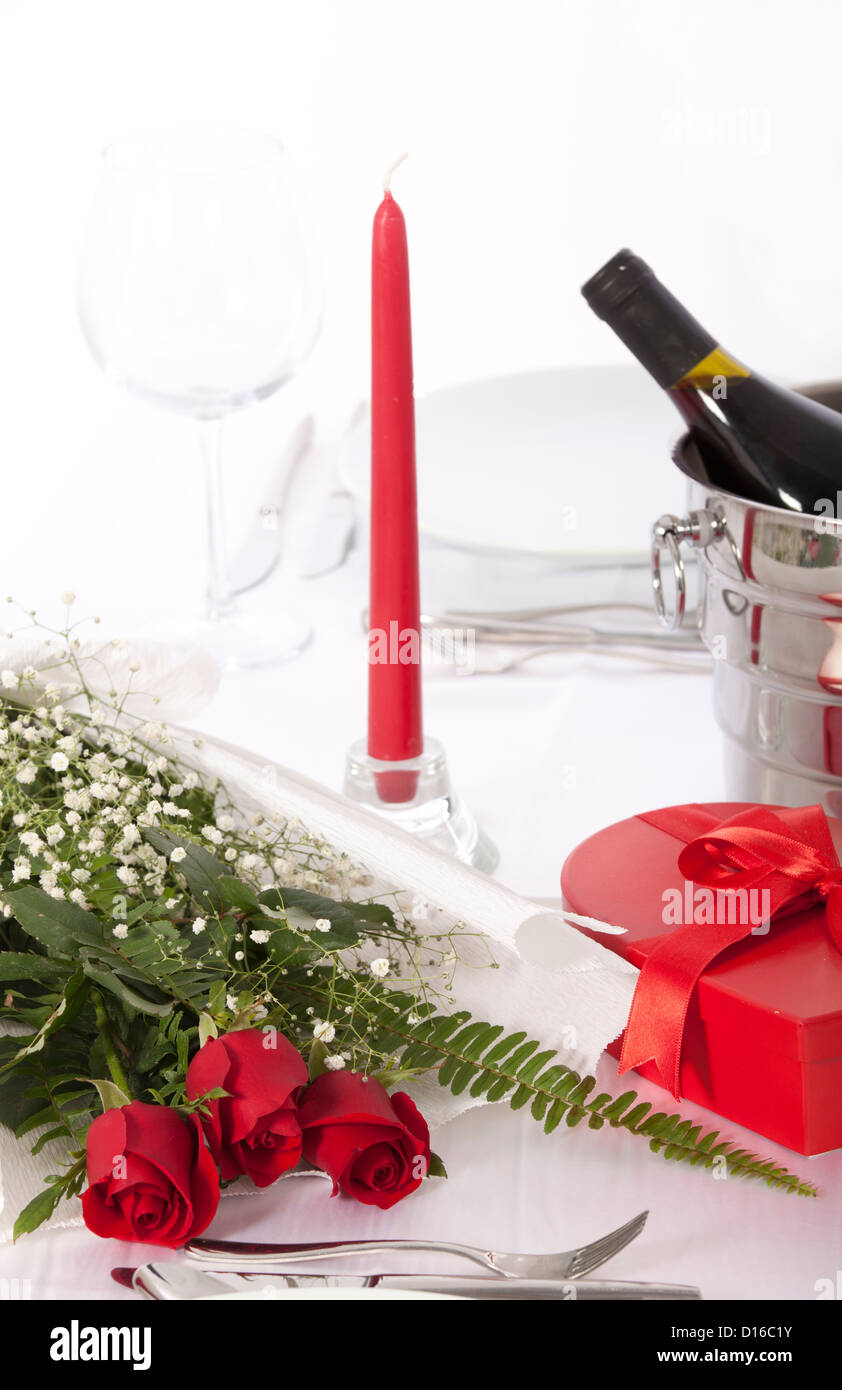 Romantic table setting with rose and cutlery Stock Photo - Alamy