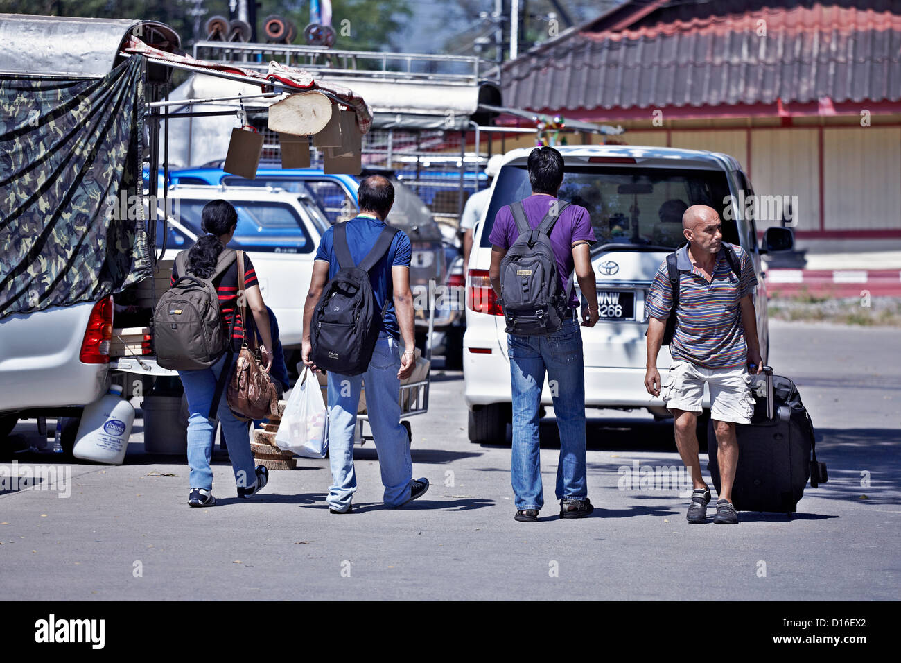 Group of travelers and backpackers coming and going in S. E. Asia Stock ...