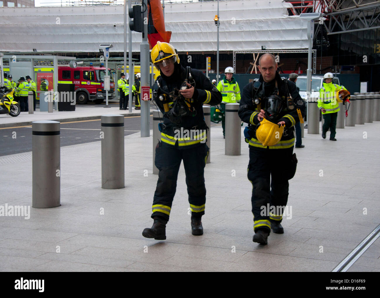 9 December 2012, London; Firefighters in breathing apparatus arrive ...
