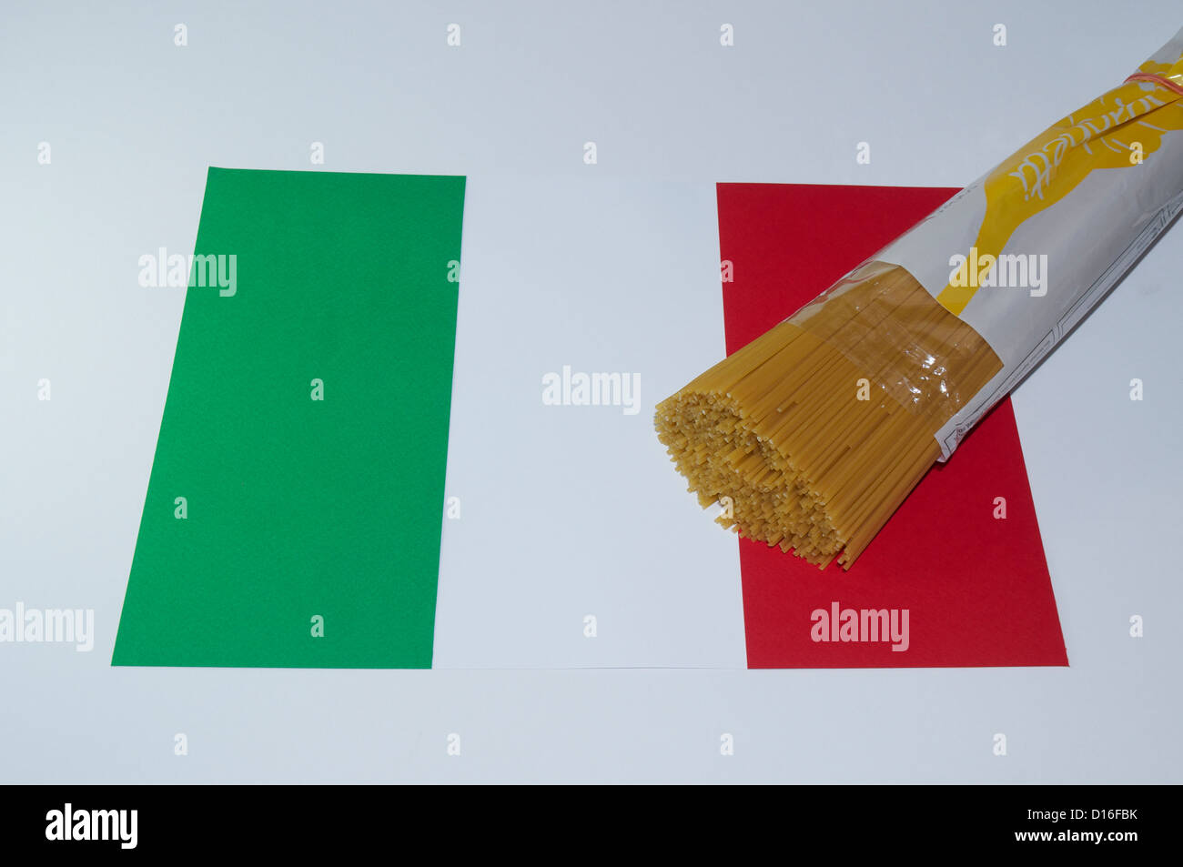 Italian flag and an open packet of spaghetti Stock Photo - Alamy