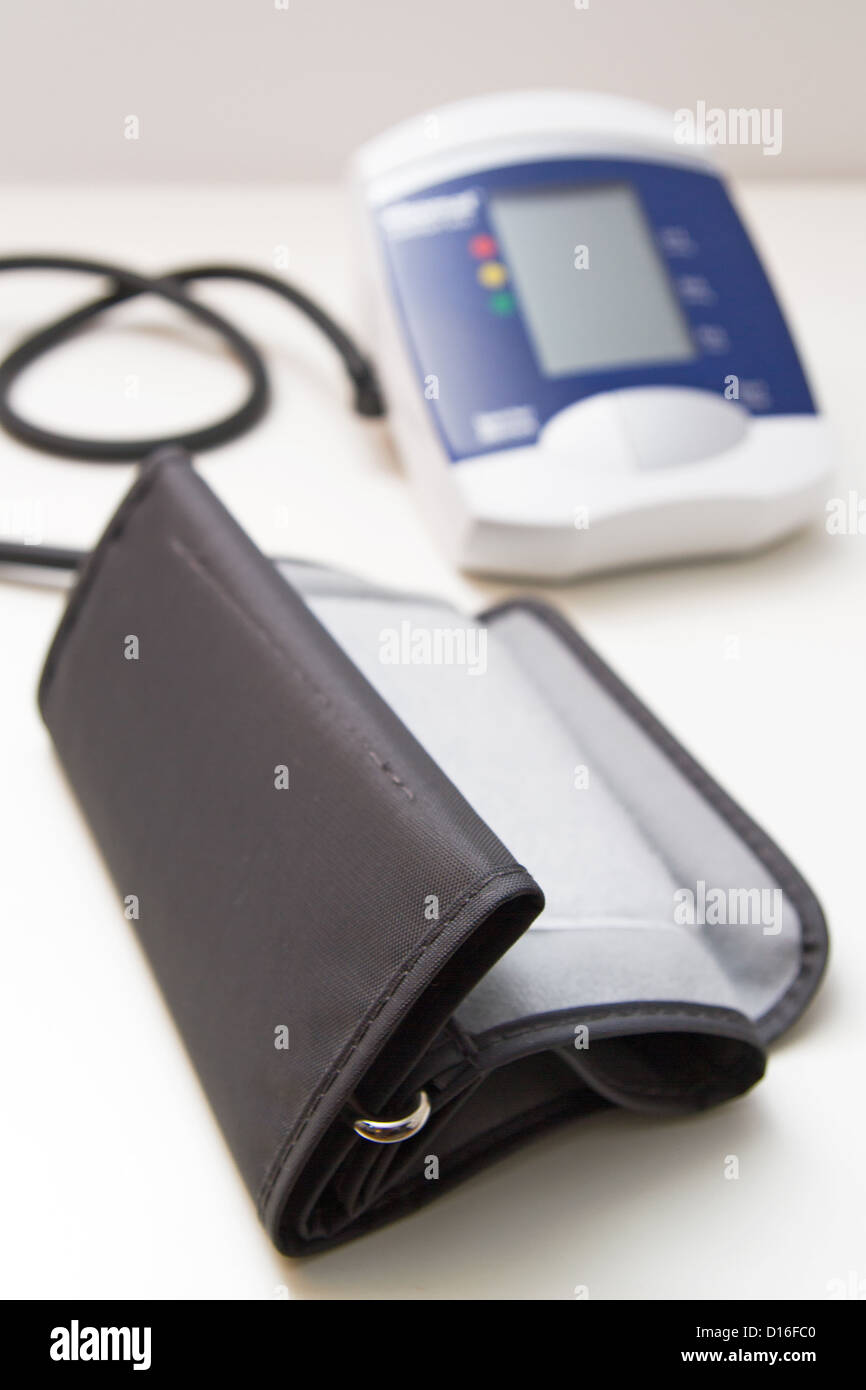 Blood pressure monitor on white background Stock Photo - Alamy