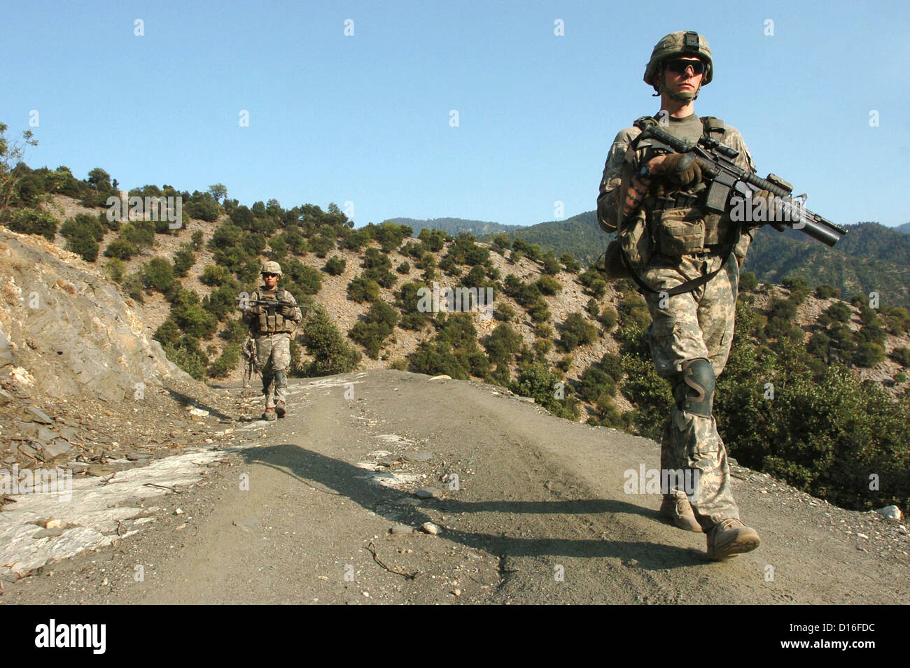 US Army Soldiers patrol the Korengal Valley August 18, 2009 in Kunar ...