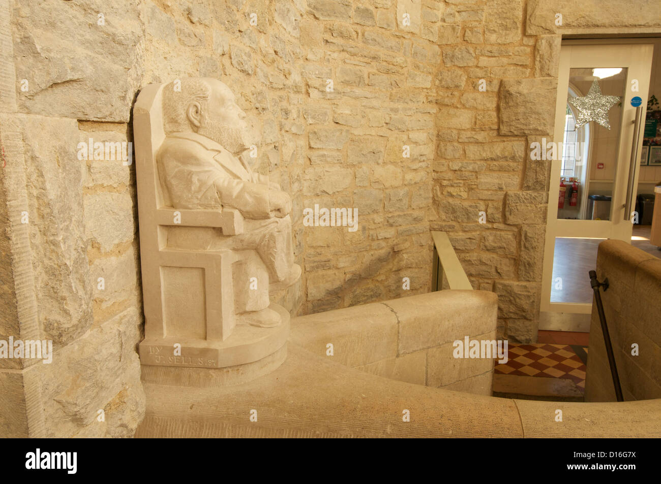 Interior of Durlston Castle with stone carving of founder George Burt ...
