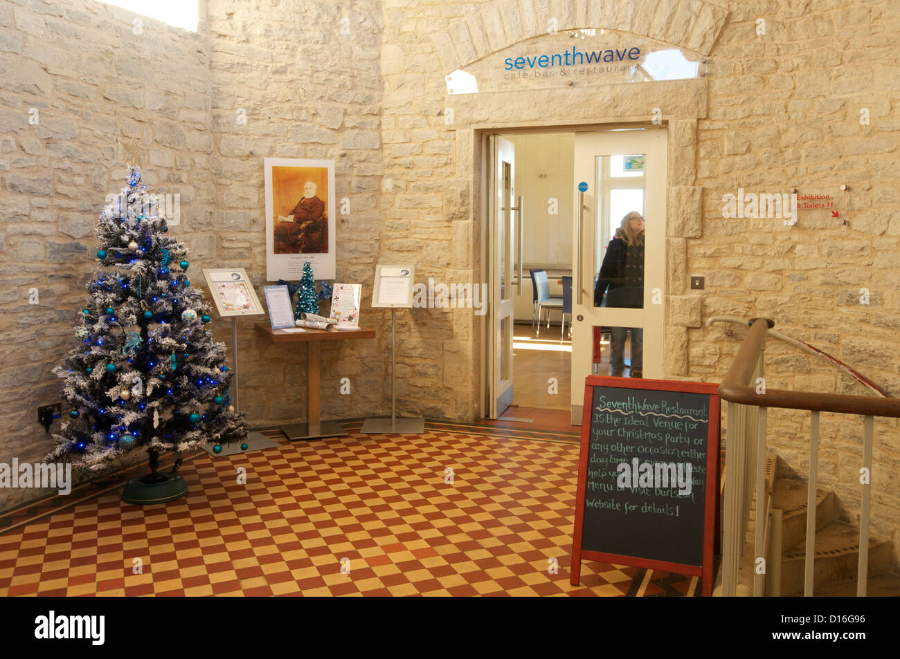Interior of Durlston Castle with portrait of founder George Burt on far ...