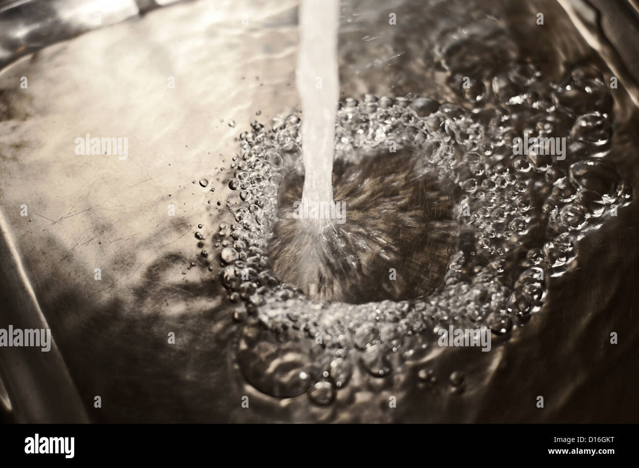 Wasting water at home hi-res stock photography and images - Alamy