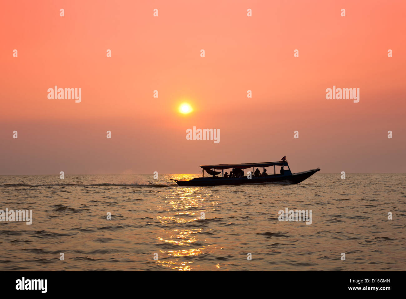 Sailing ship at sunset over the sea Stock Photo - Alamy