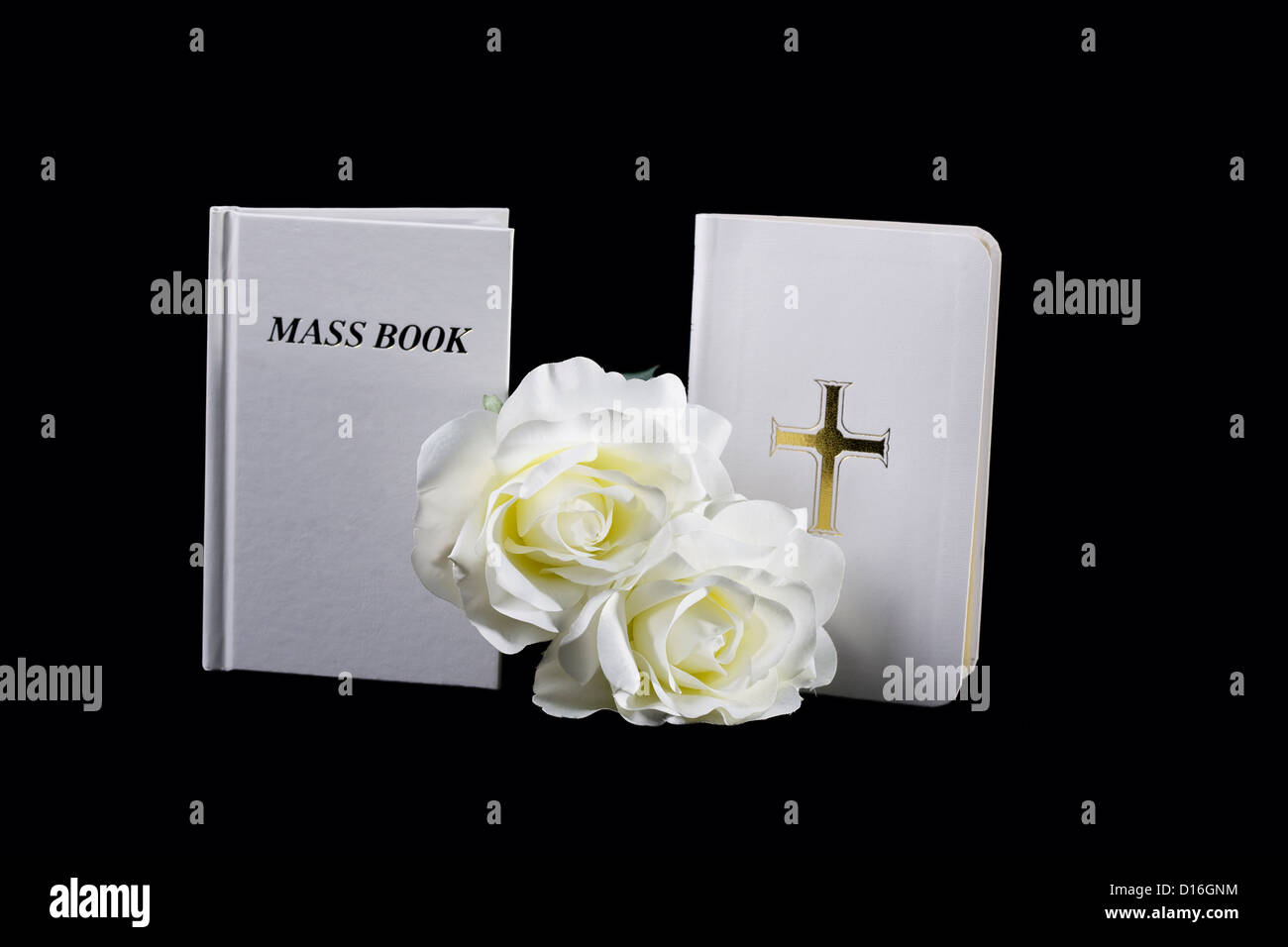 A bible and a Catholic Mass Book on Black Stock Photo - Alamy