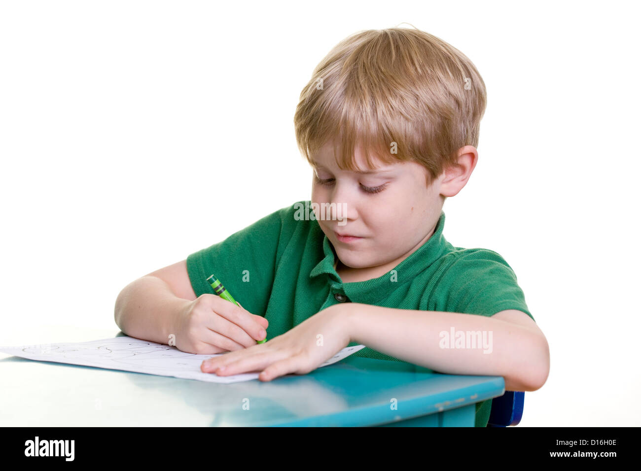 A child colors a page Stock Photo - Alamy