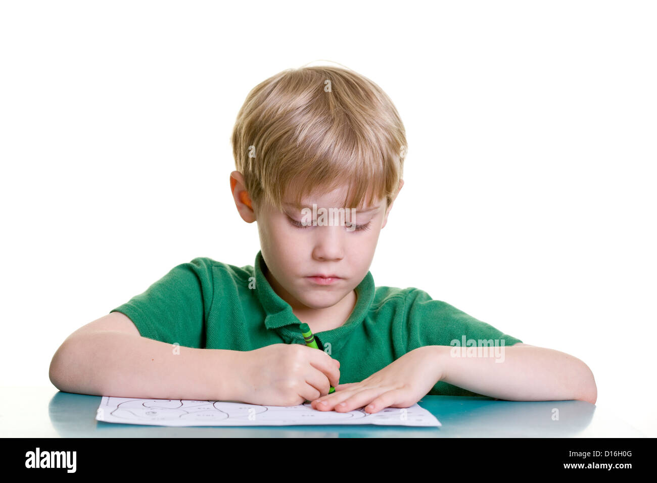 A child colors a page Stock Photo - Alamy