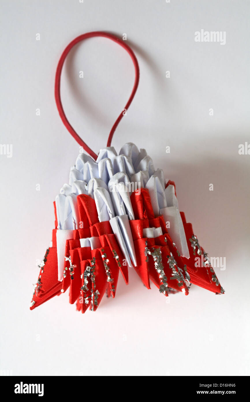 Origami red and white glittery Christmas bell isolated on white ...