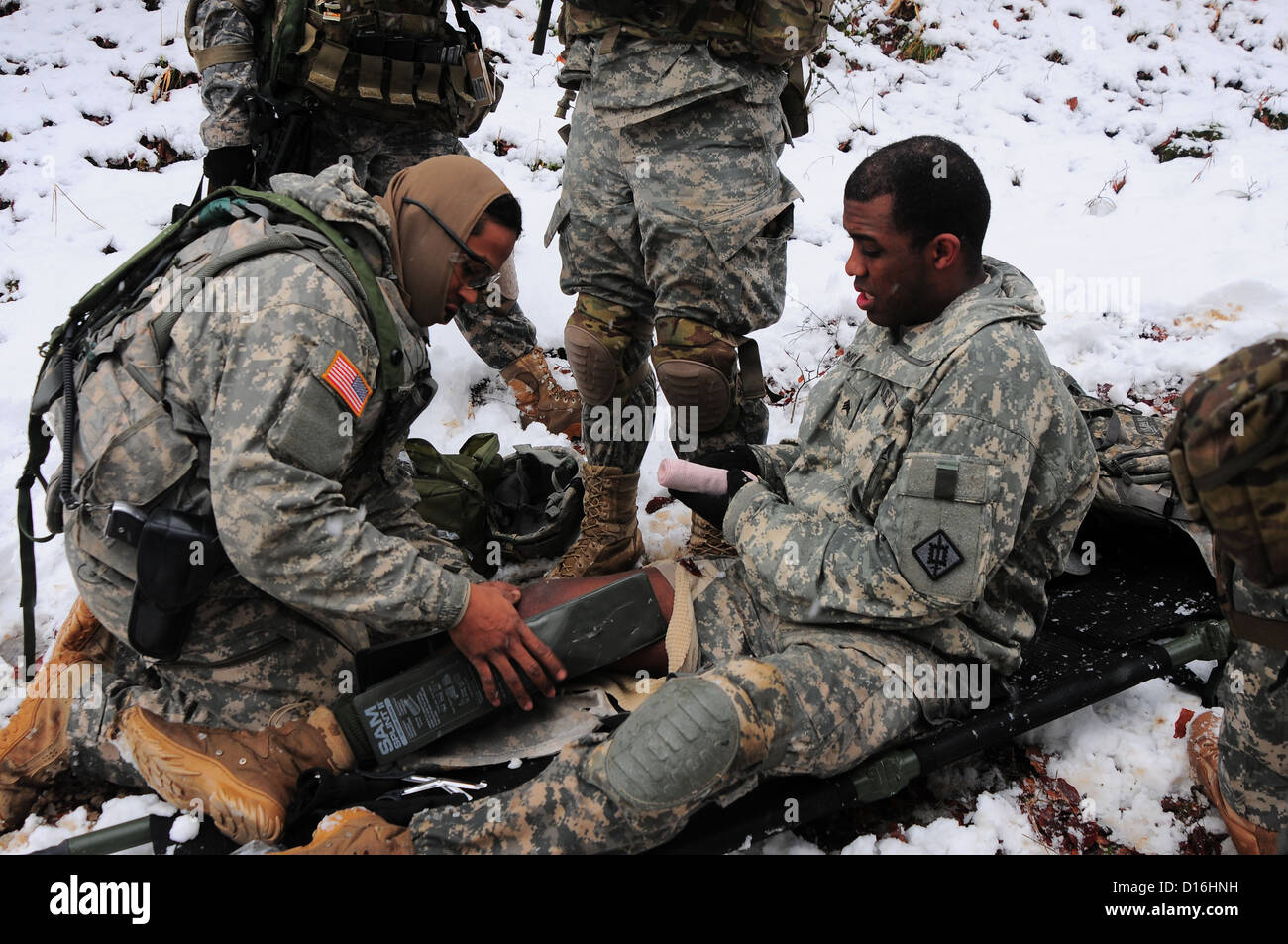 A U.S. Army soldier from the 541st Engineer Company provides medical ...