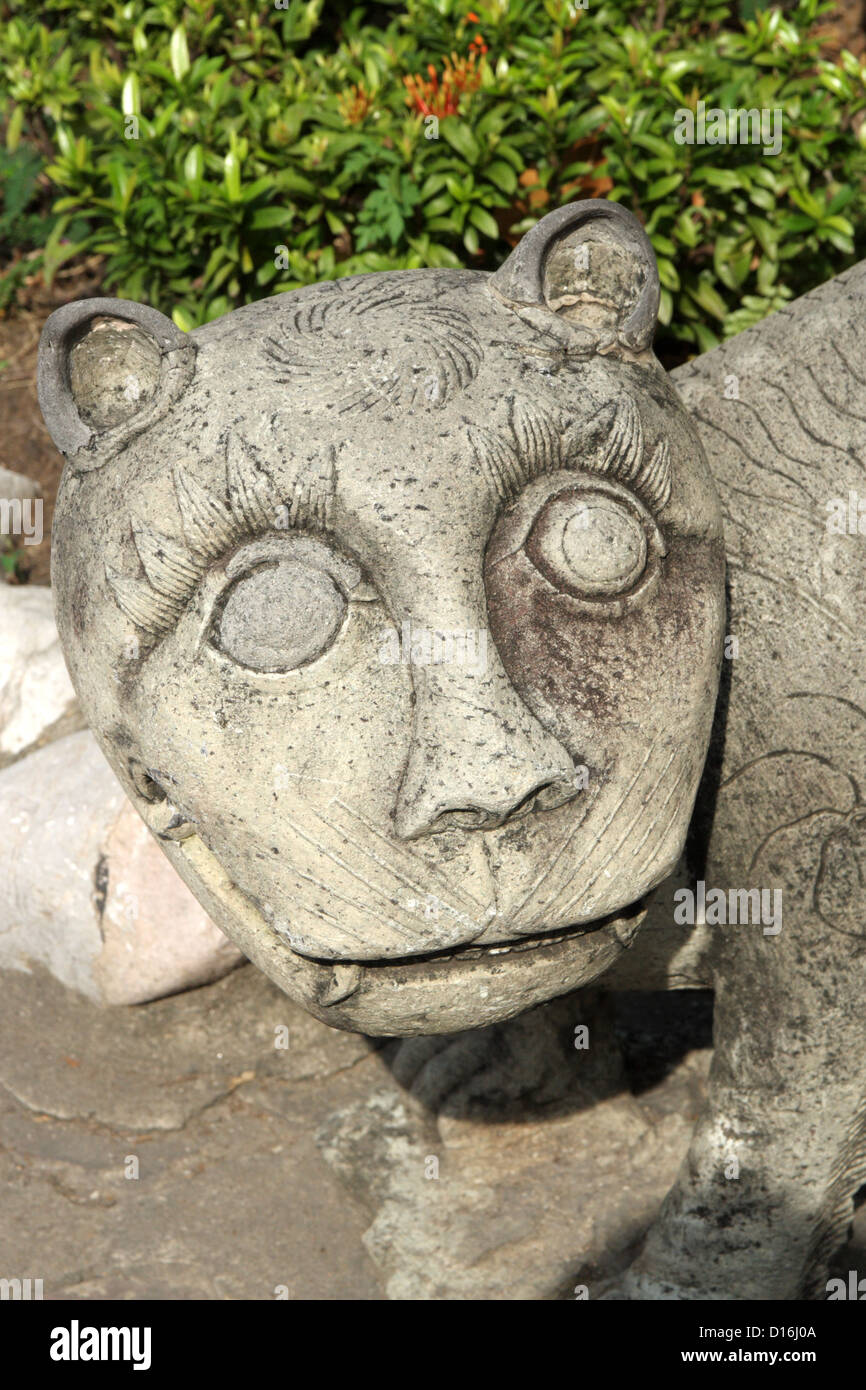 Old Chinese tiger statue at Wat Pho temple in Bangkok , Thailand Stock ...