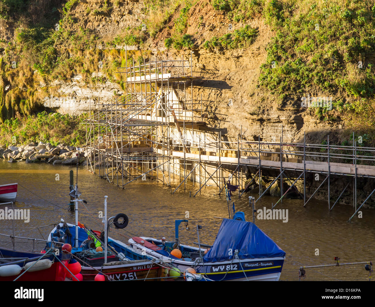 Civil engineering work to underpin a cliff where collapse would put a ...