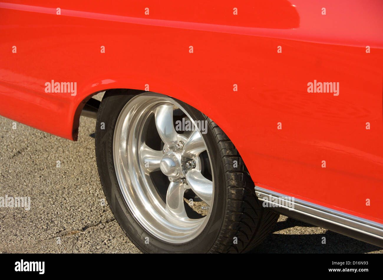 Classic red car with tire Stock Photo - Alamy