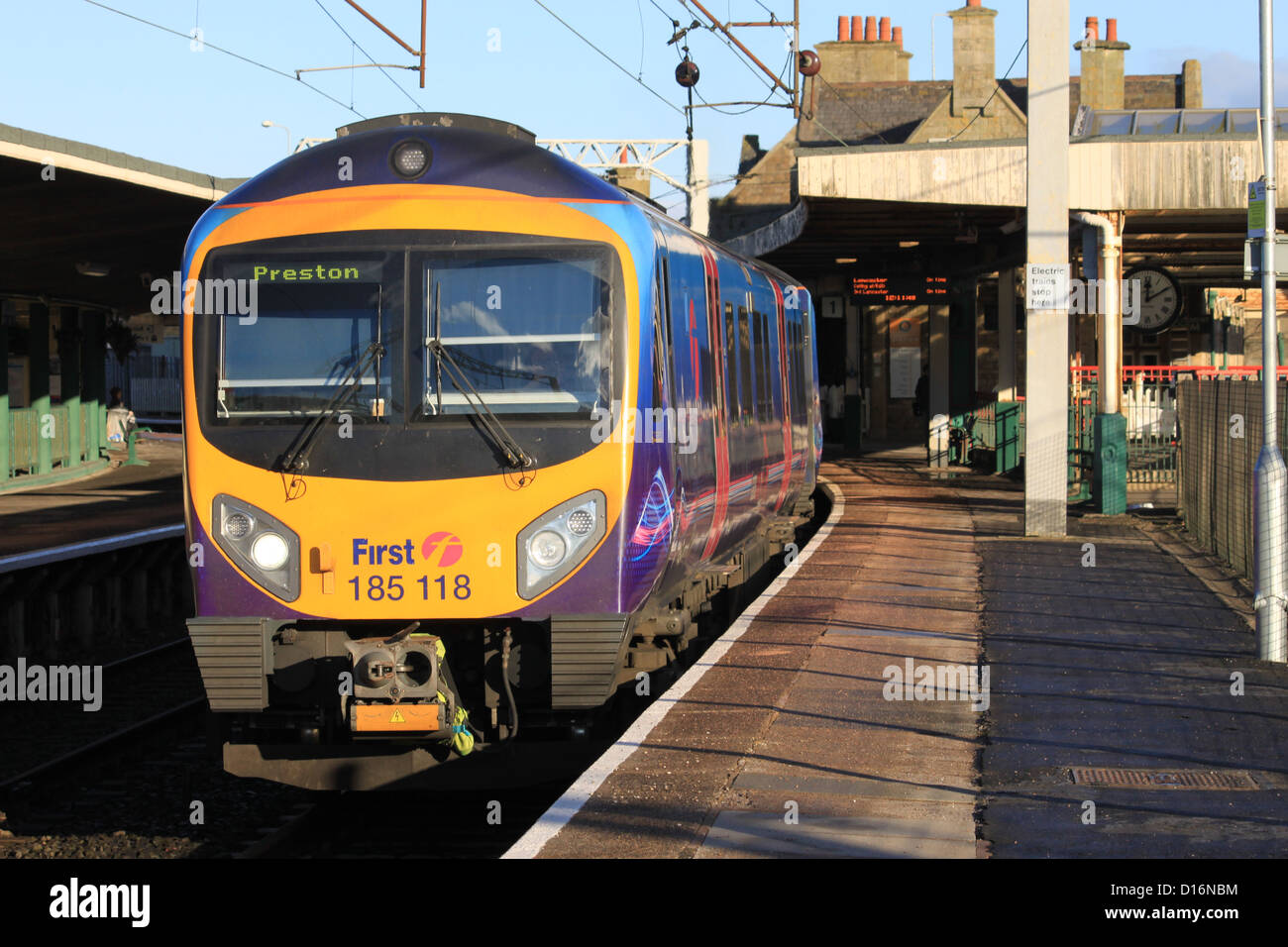 Class 185 diesel multiple unit leaving platform 1 at Carnforth railway ...