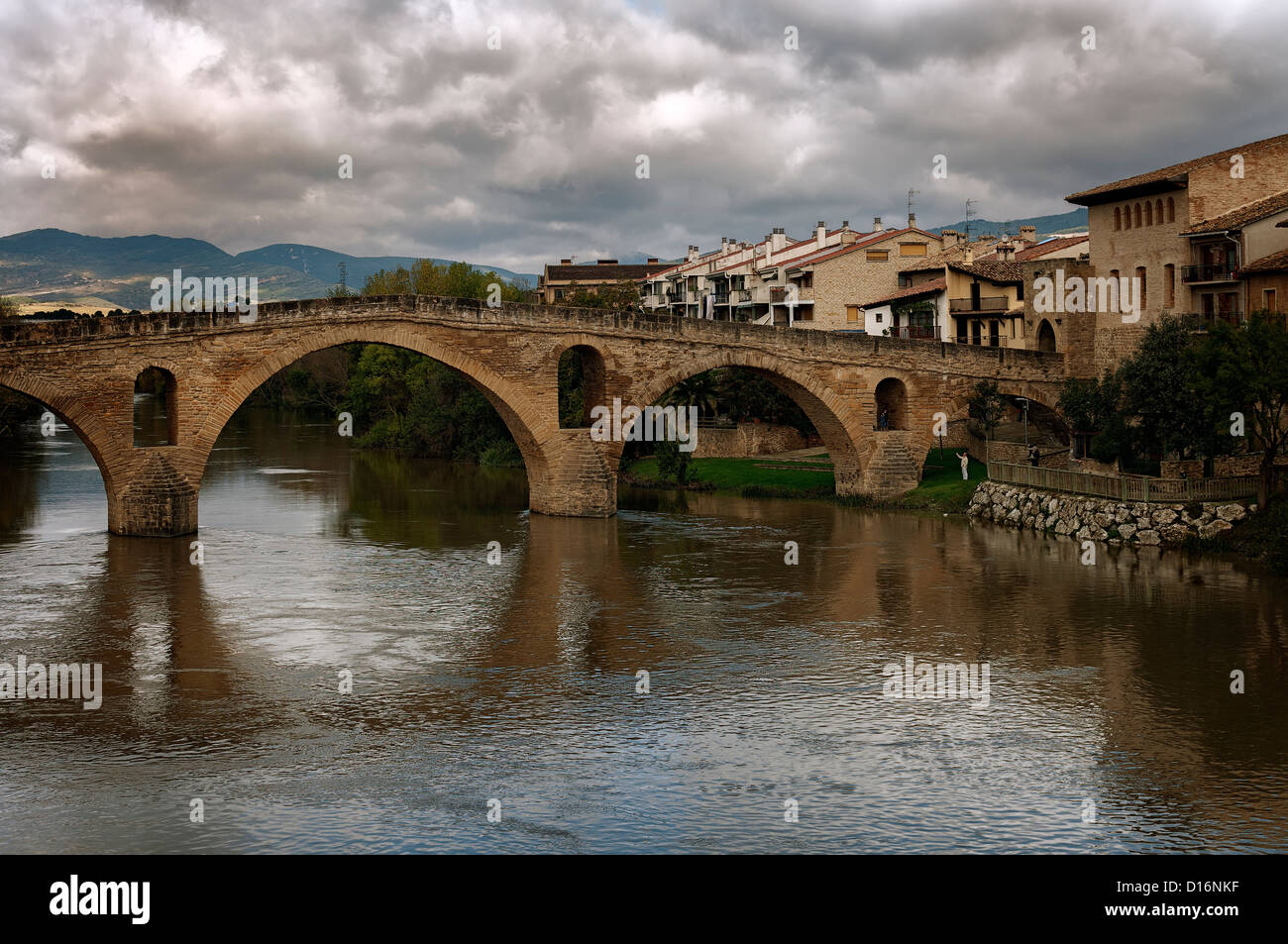 Medieval bridge over Arga river, in Puente la Reina, village of Navarra ...