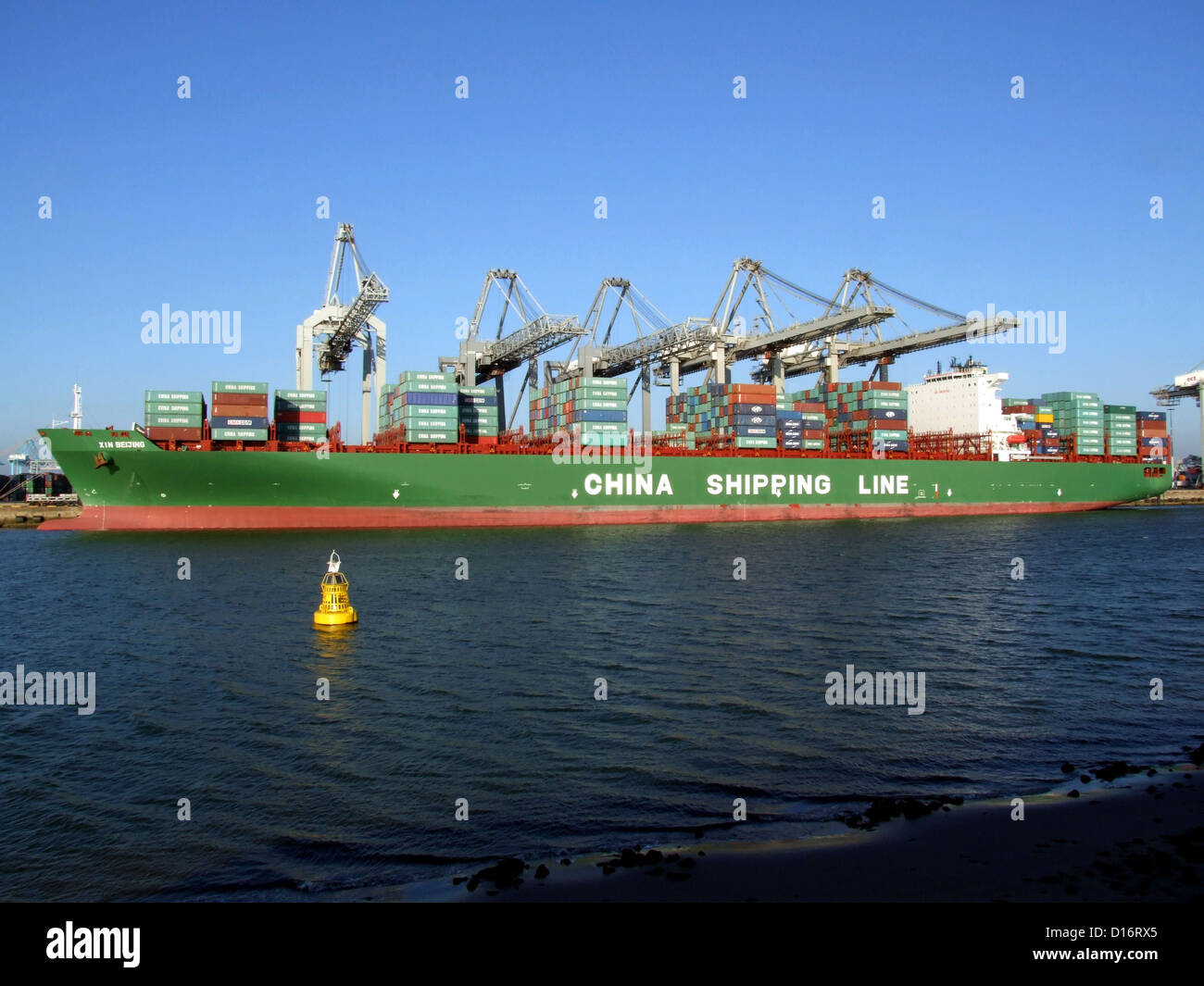 The Xin Beijing, an IMO 9314246 registered vessel, is docked at the ...