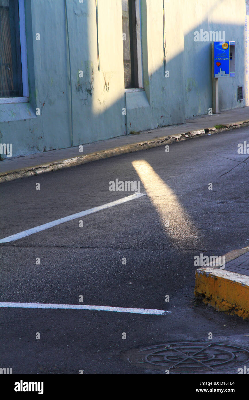 Street, manhole and spilling light, Mexico Stock Photo - Alamy