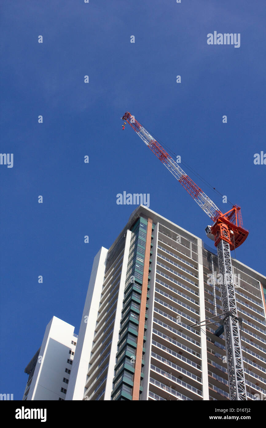 Construction crane and apartment building Stock Photo - Alamy