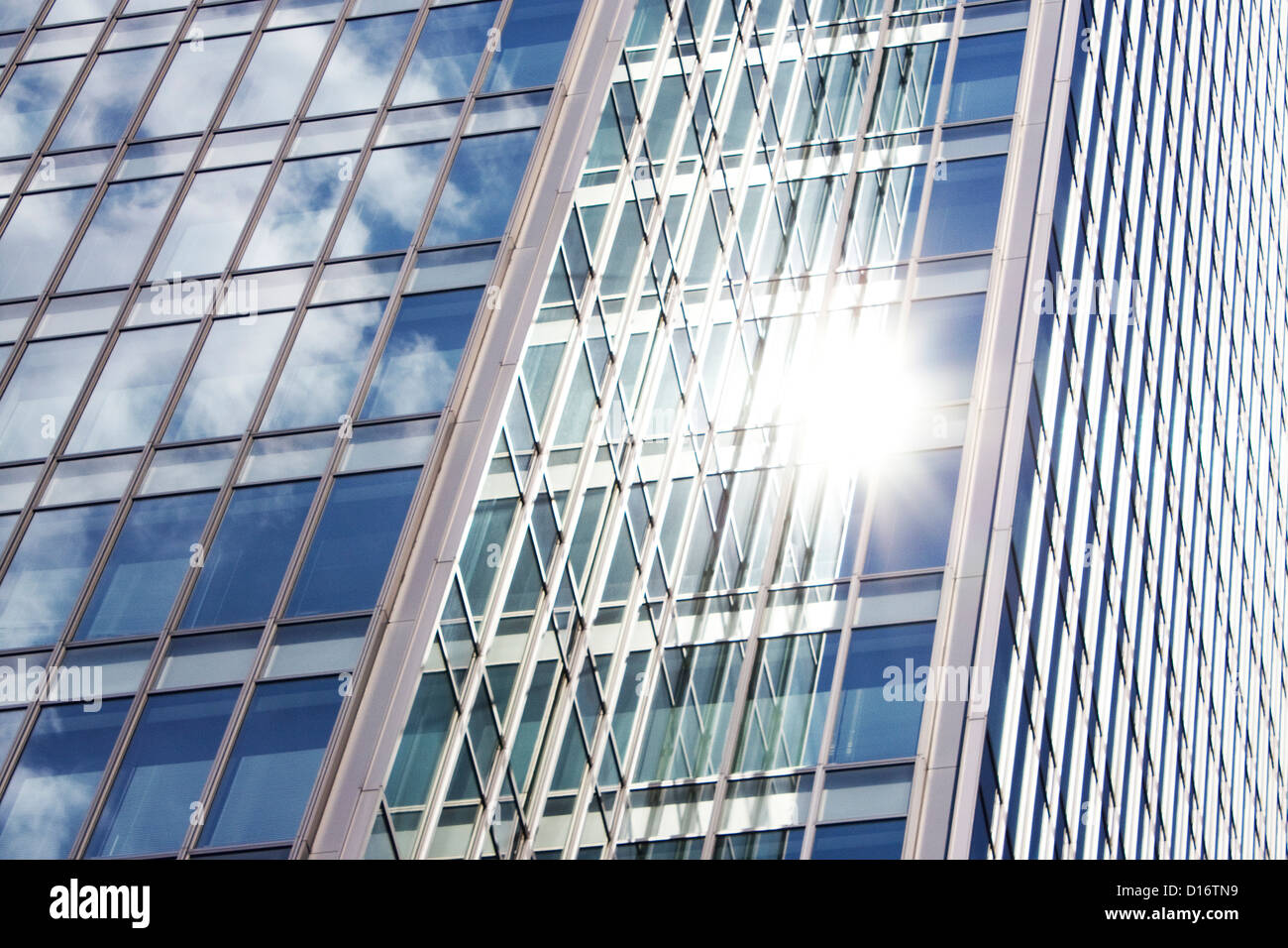 Sun reflecting on office building windows Stock Photo - Alamy