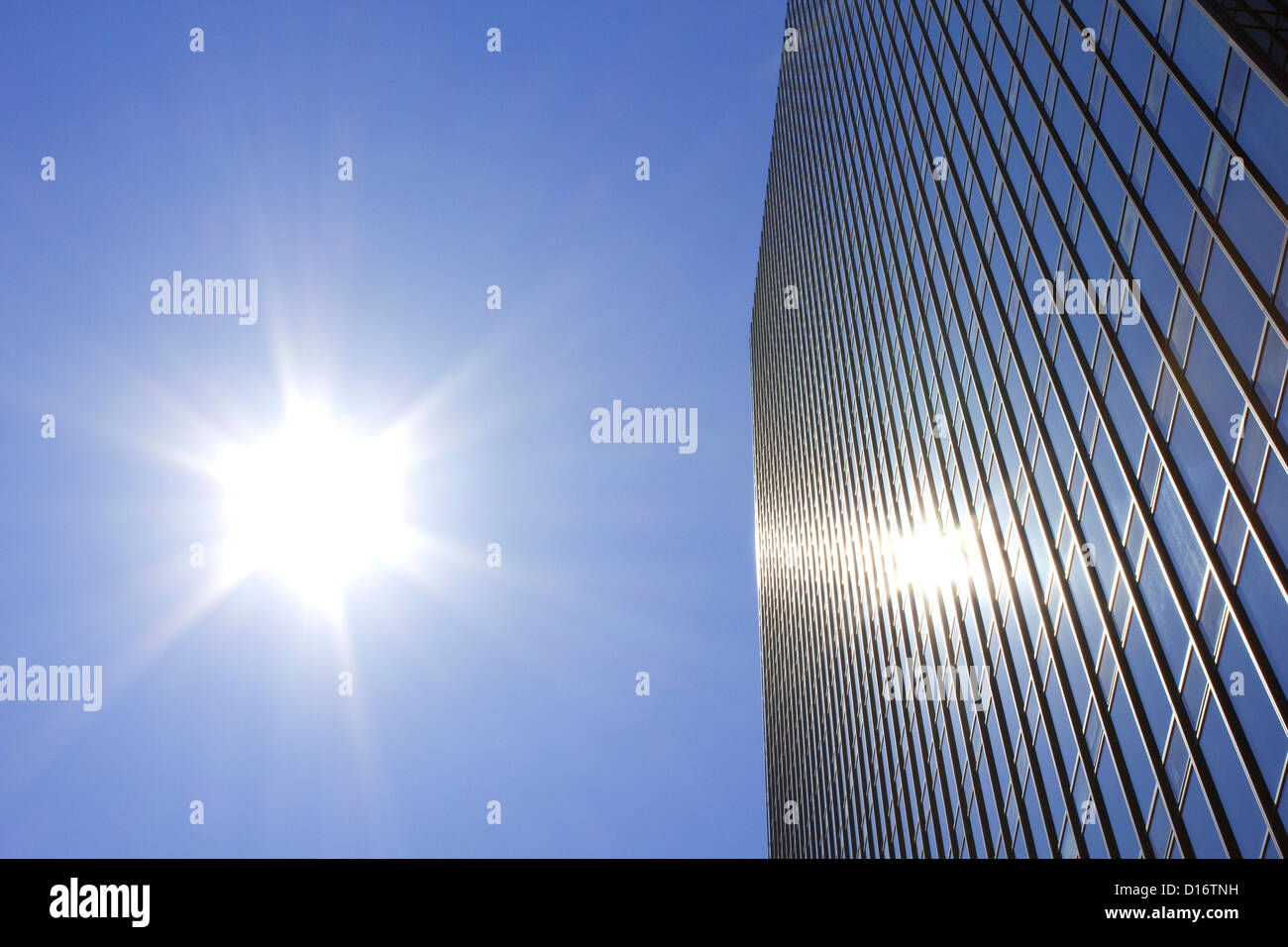 Sun reflecting on office building windows Stock Photo - Alamy