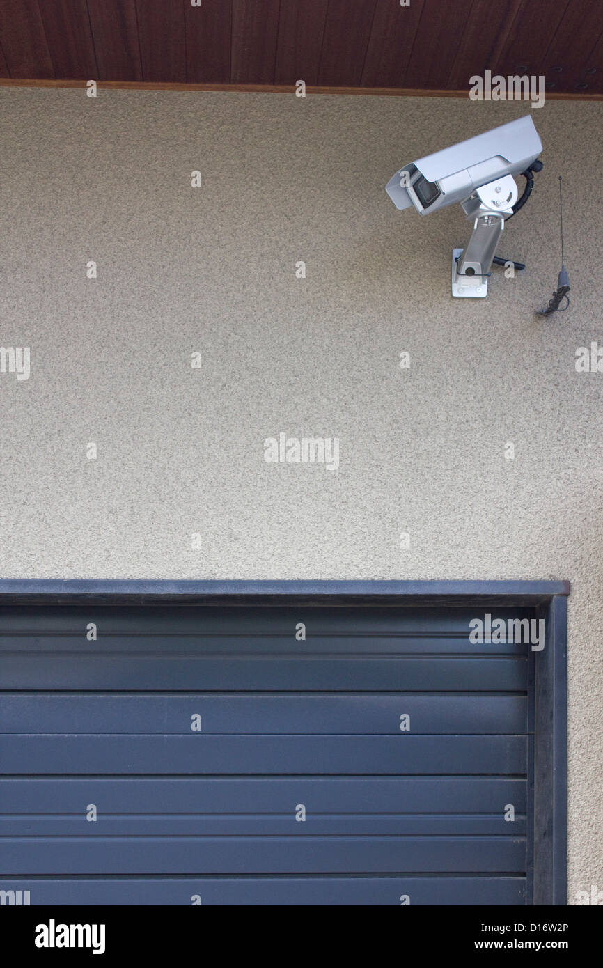 Security camera installed on wall Stock Photo - Alamy