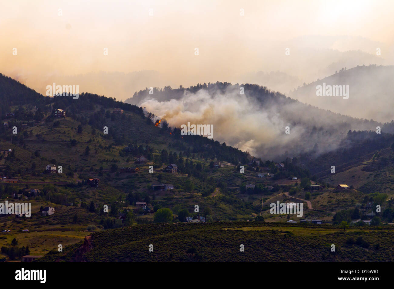 Wildfire smoke rises from burning homes in Colorado Stock Photo - Alamy