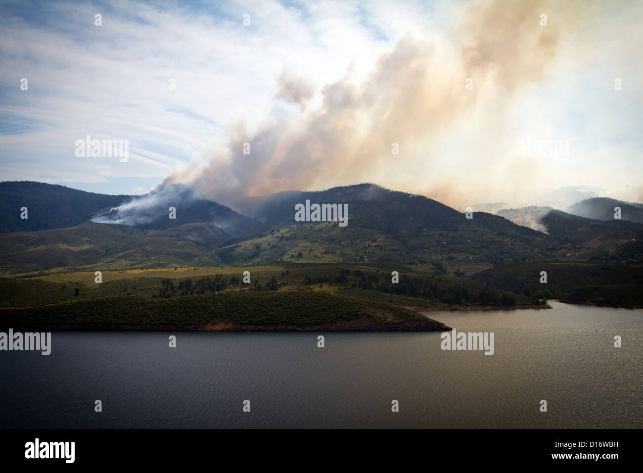 Wildfire smoke rises on burning mountains in Colorado Stock Photo - Alamy