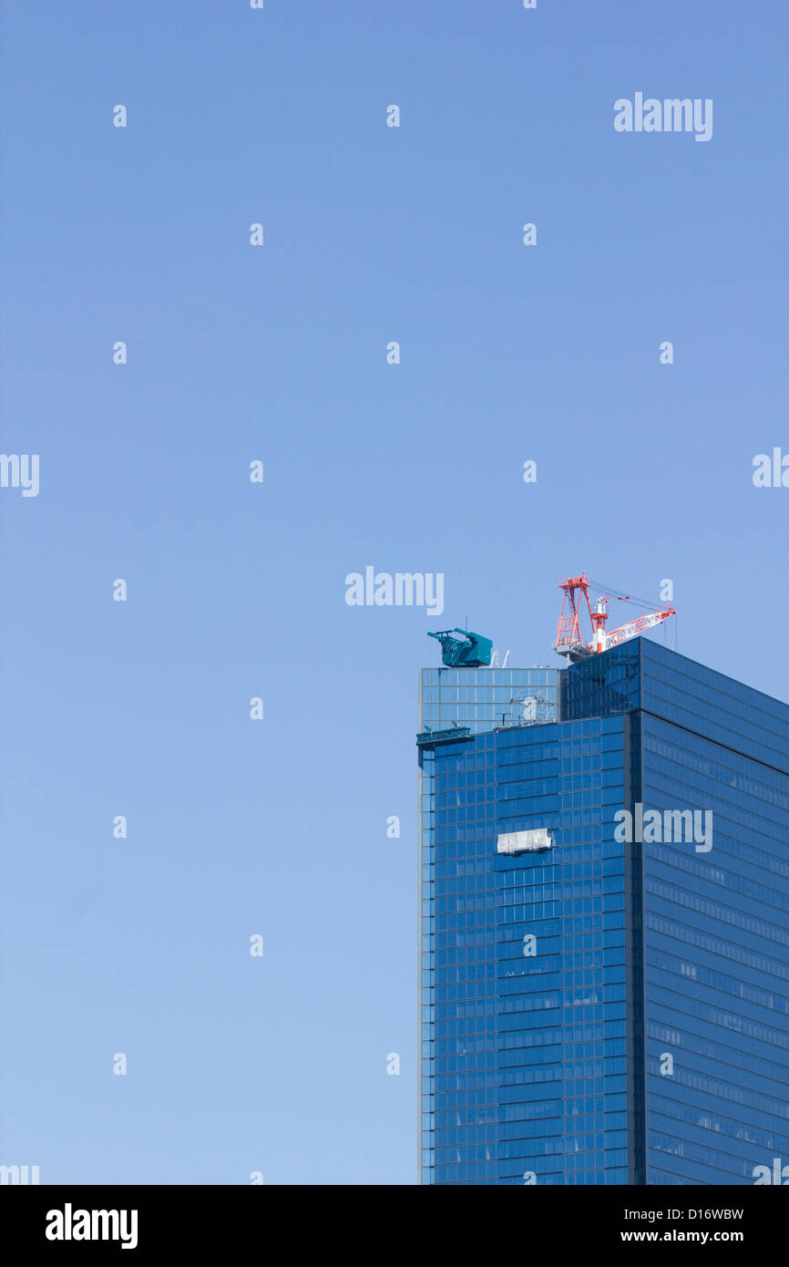 Office building and blue sky Stock Photo - Alamy