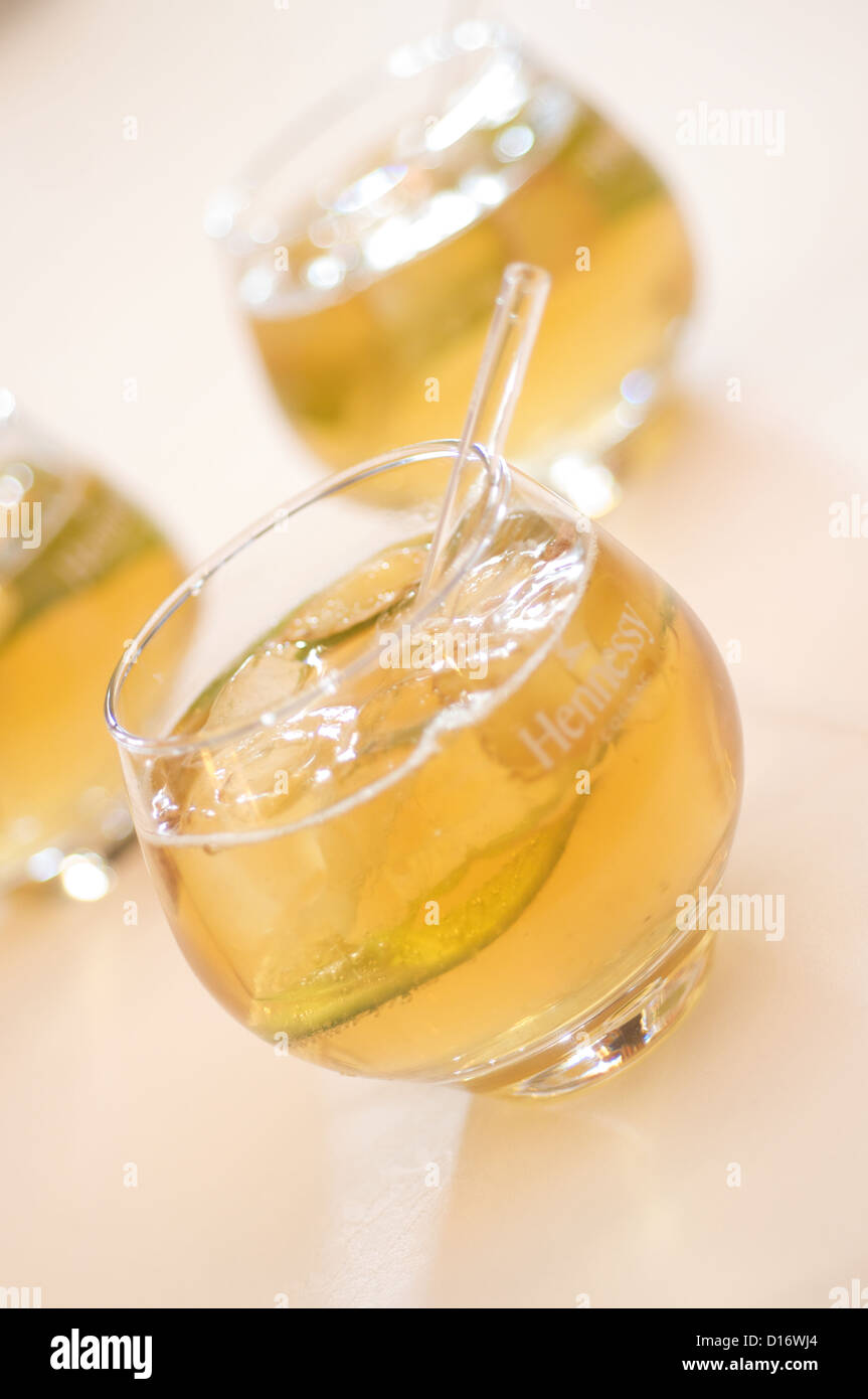 Fancy cocktails in small glass and mint with straw Stock Photo - Alamy